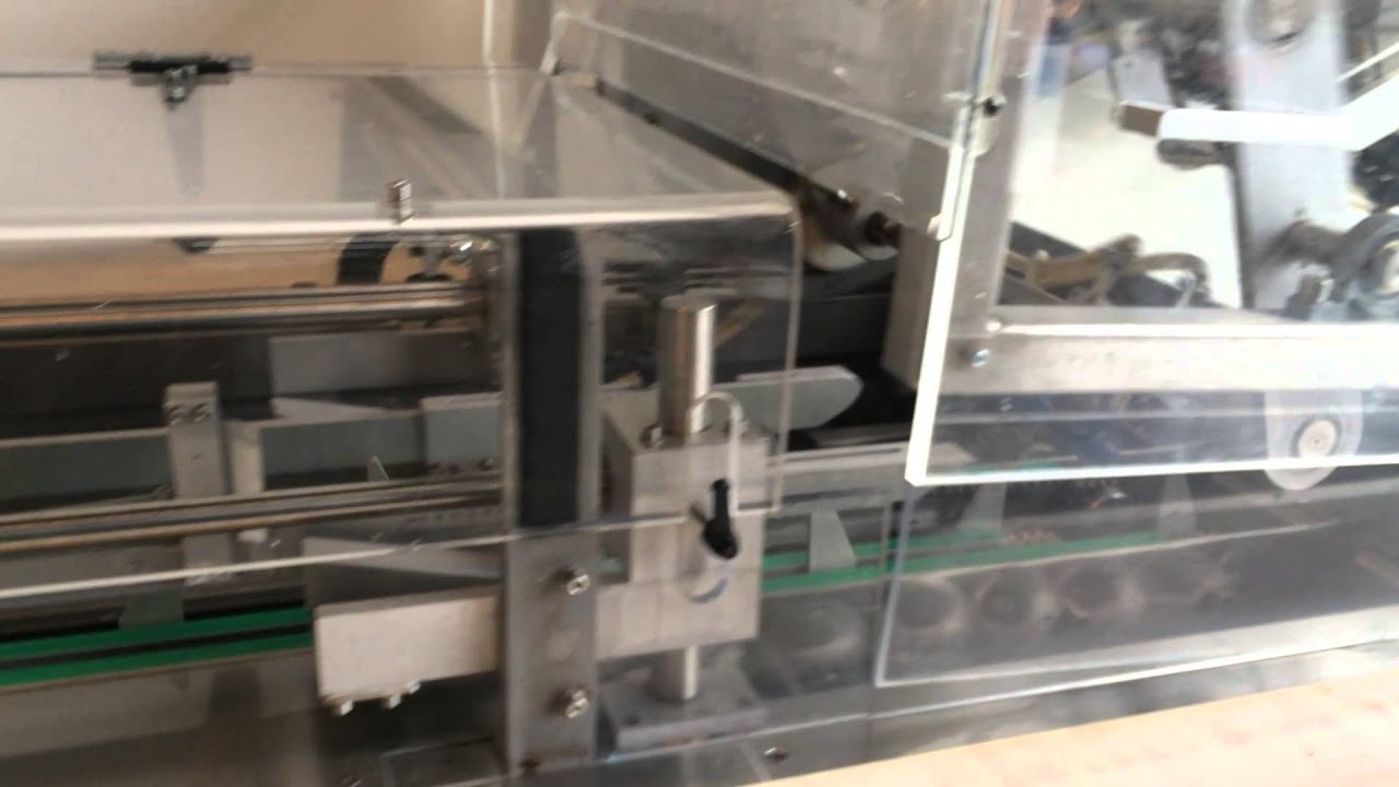 Freemantle semi automatic end load cartoner - YouTube
