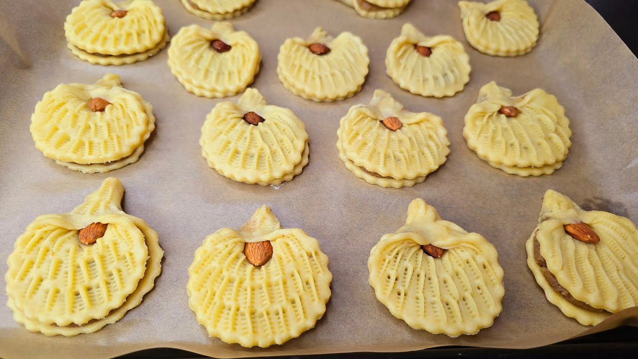 Calla Lily Shaped Cookies with Walnut Filling and Almond Topping - YouTube