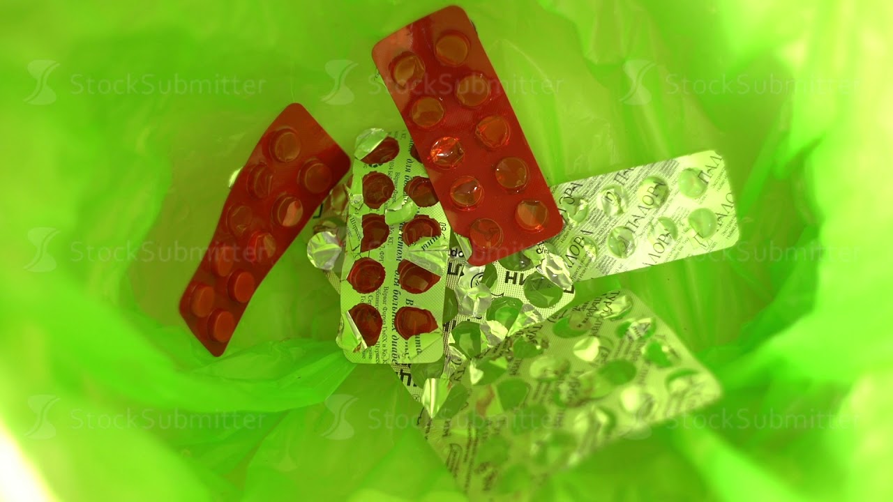drugs, empty packs from pills falling into the trash garbage can - YouTube