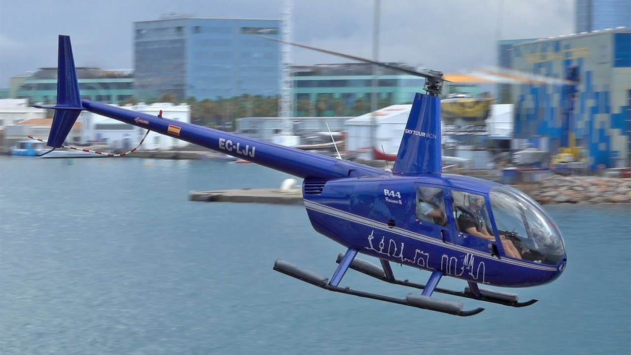 Robinson R44 Raven II helicopter landing & takeoff action at Barcelona ...
