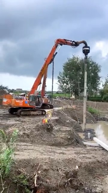 Long concrete piling directional insertion process Excavator piling - YouTube