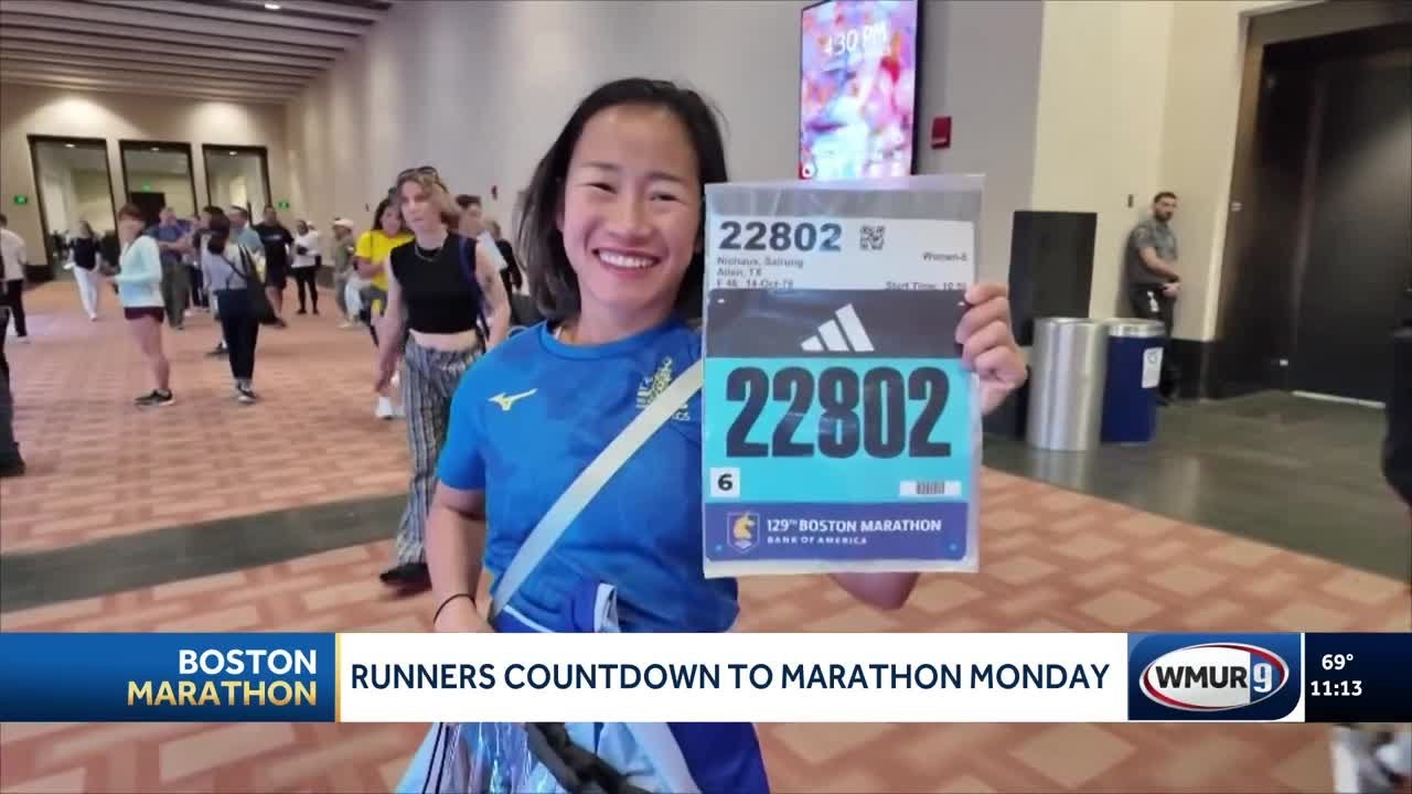 Runners pick up race bibs ahead of Monday's Boston Marathon - YouTube