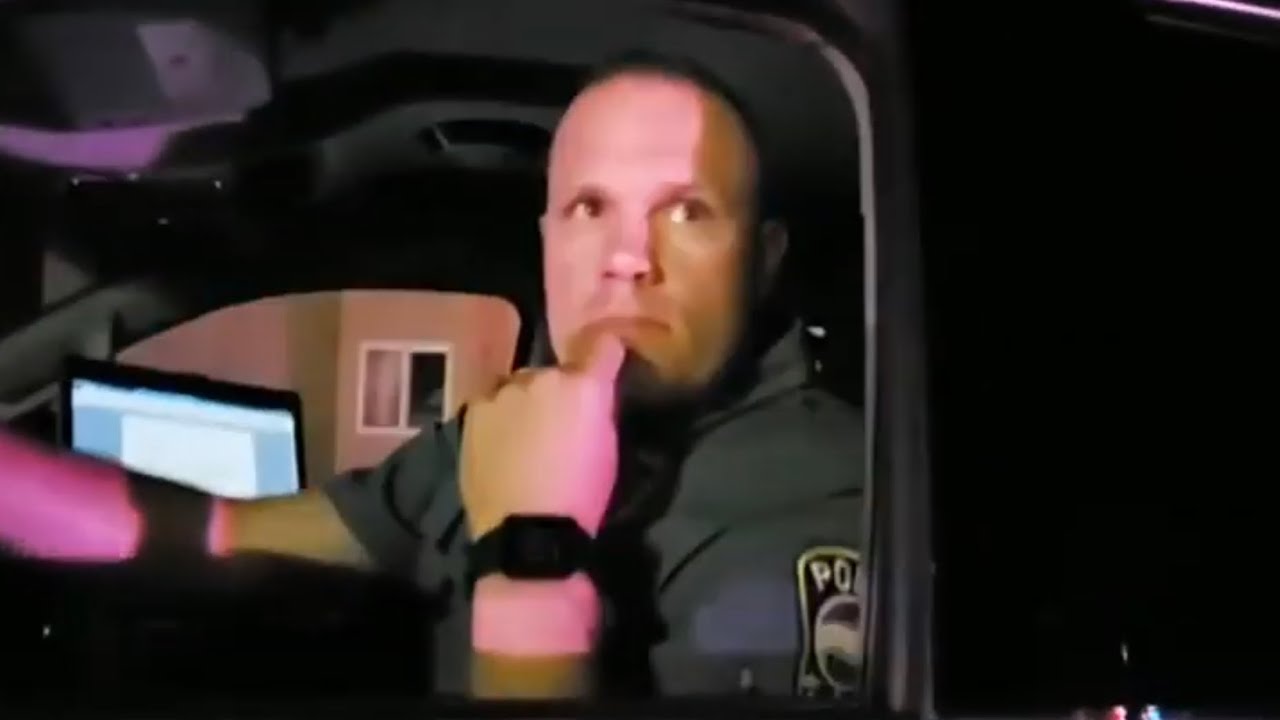 CRAZY COP JUMPS OUT THE CAR AND TACKLES CAMERA MAN!!! 1st amendmemt ...