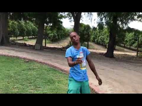 Guy drinking cheap wine then vomits it out