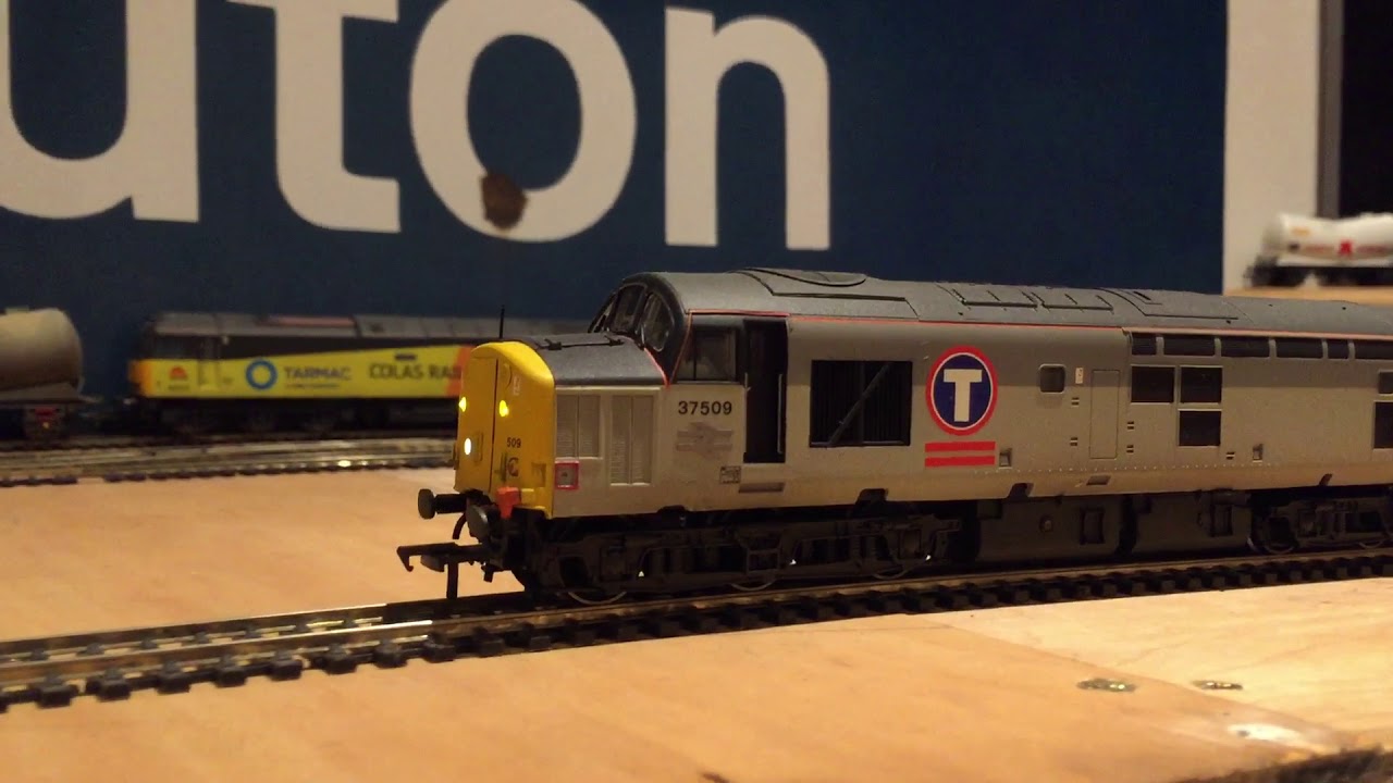 Class 37509 Transrail take load coal HEA Hoppers from yard - YouTube