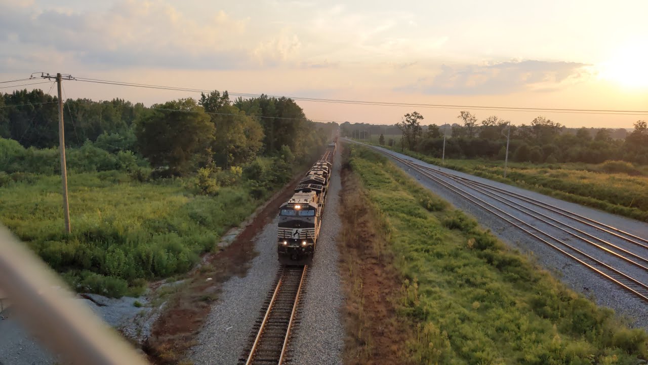 NS 9741, NS 3628, and NS 7663 pull an Eastbound NS Mixed Freight ...