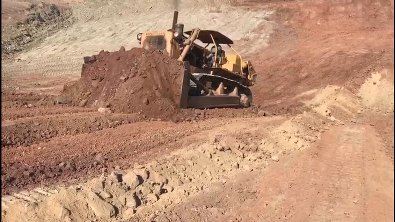 Cat dozer on steep slope! - YouTube
