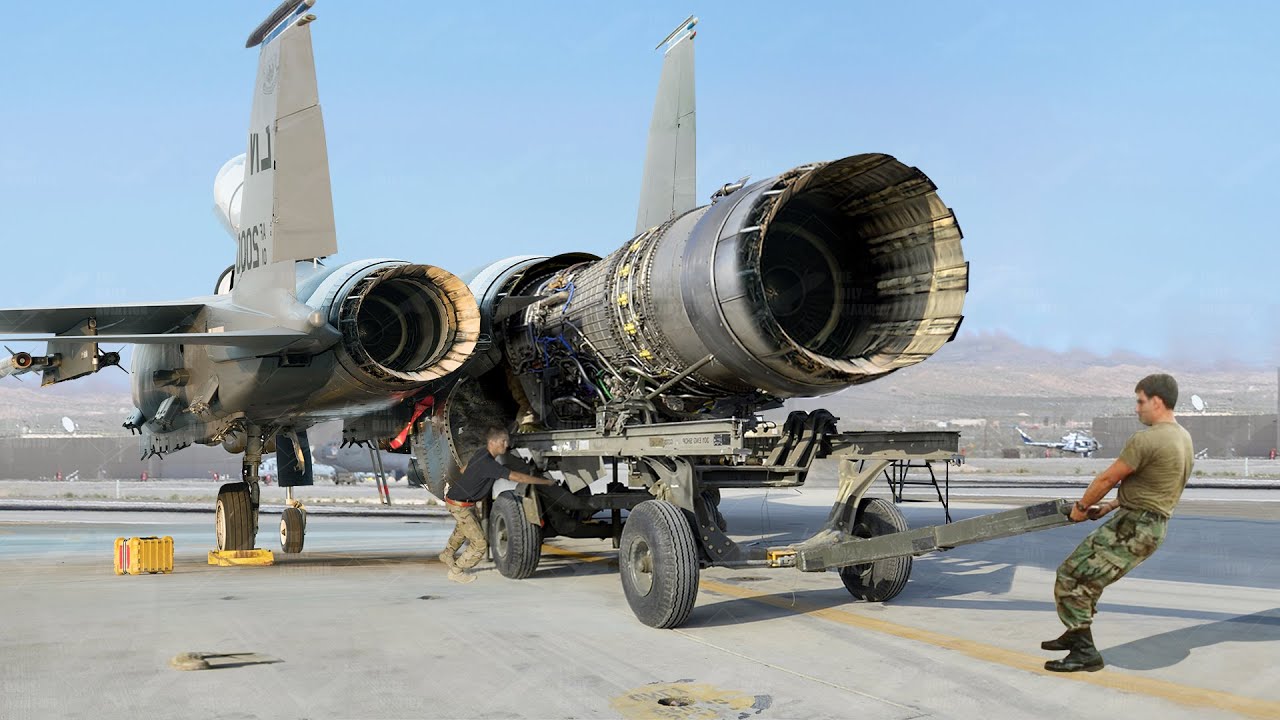 Pulling out Giant $7 Million US F-15 Engine For Repairs - YouTube