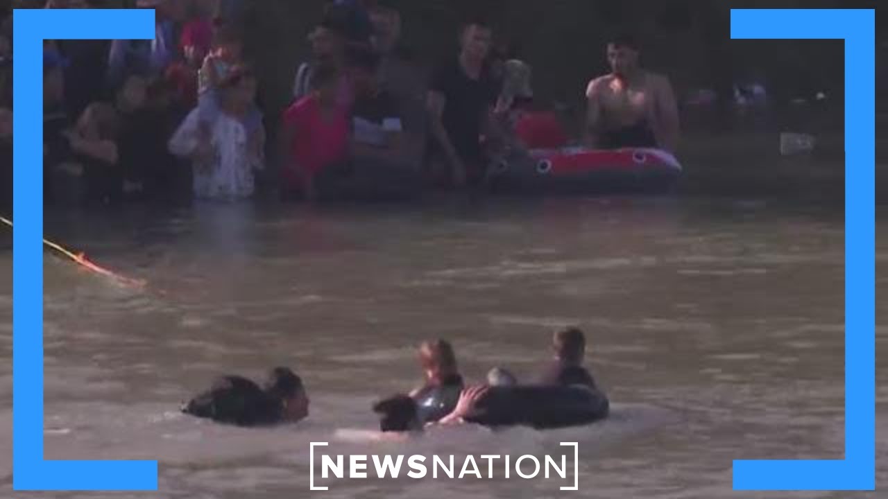 Migrants use ropes, human chains to cross fast-moving river into US ...