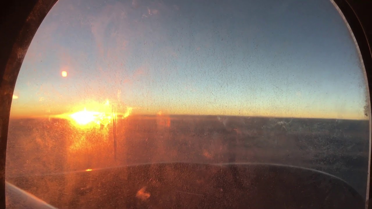 Sunset view from airplane window - YouTube