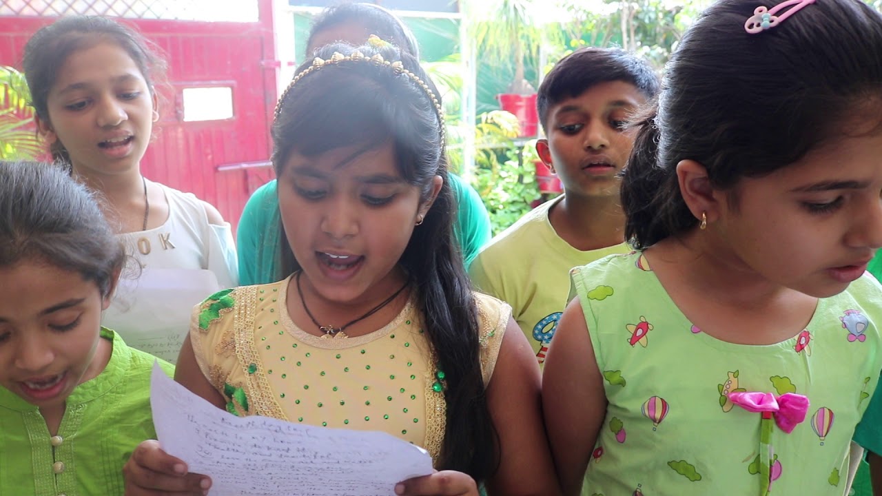 A song "Keeping the earth clean"sing by children and prepared by music ...