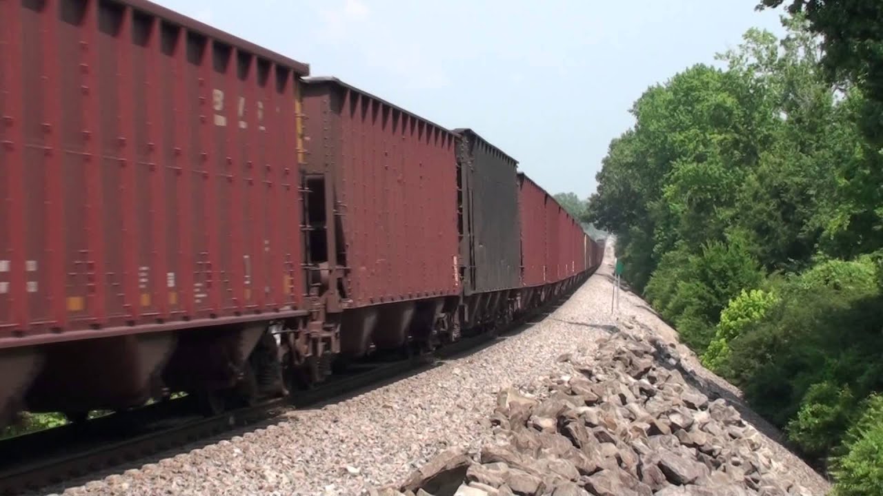 BNSF SD70MAC 9770 leads U-BIRSEM at Greenwood Springs, Mississippi - YouTube