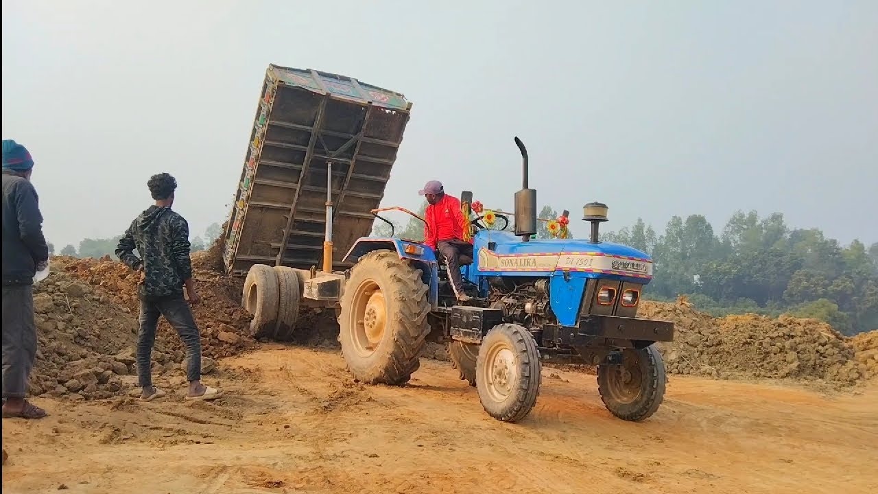 Mud Unload over the rough roads side top hills Sonalika RX50 DI Tractor ...