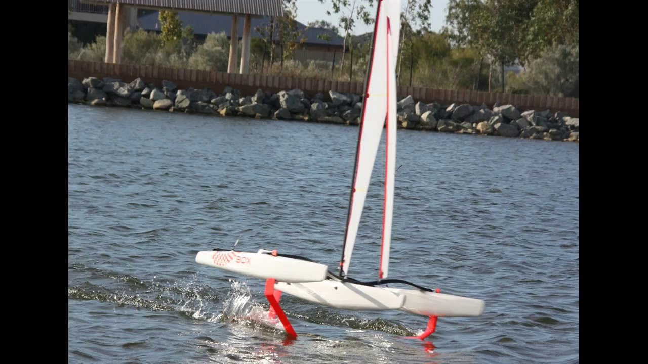 One Metre trimaran foiling - YouTube