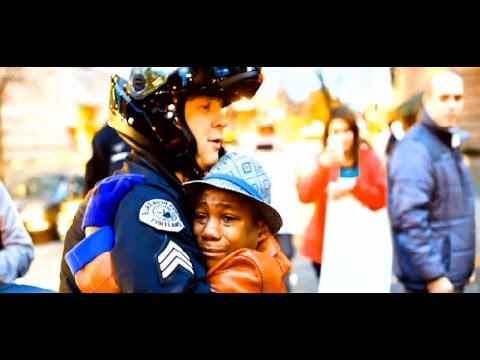 White Portland Cop Asks Young Black Boy For Hug at Ferguson Protests ...