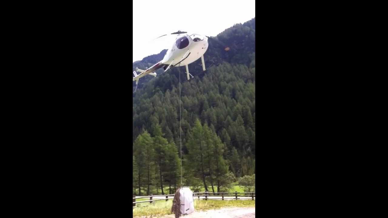 Transport with hook by ul helicopter Syton AH 130 - YouTube