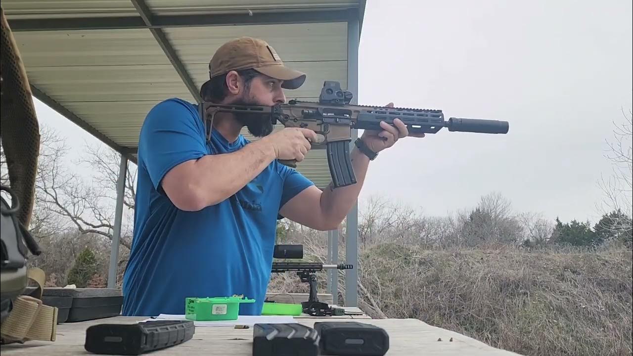 11.5 Sig Spear LT with CMMG 22lr conversion bolt and binary trigger - suppressed - YouTube