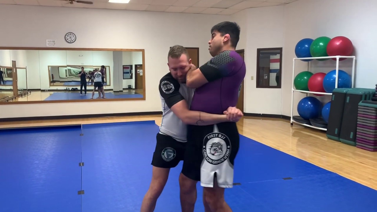 Defense against double underhooks to guillotine - YouTube