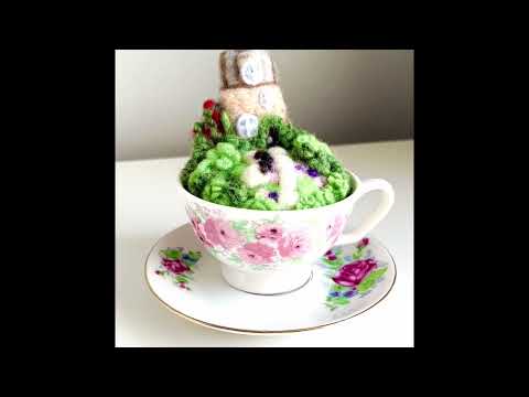 Needle felted garden in a tea cup.