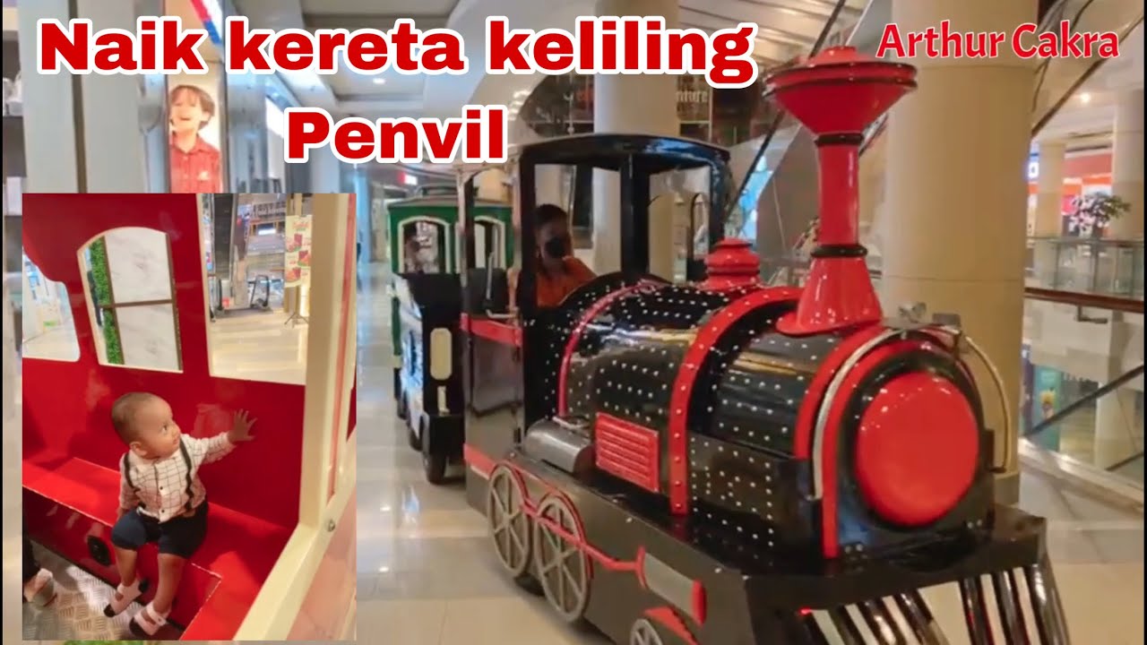 Naik kereta api keliling Mall Penvil - YouTube