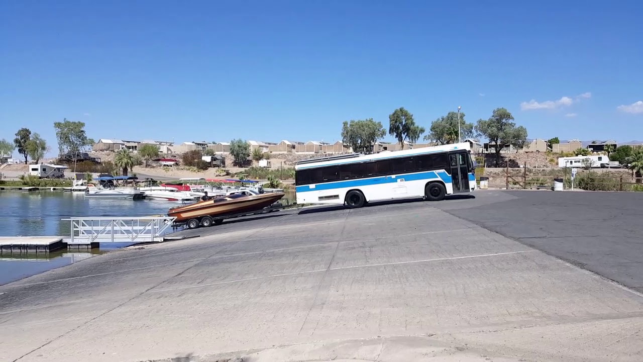 Bluebird Bus RV conversion launching boat - YouTube