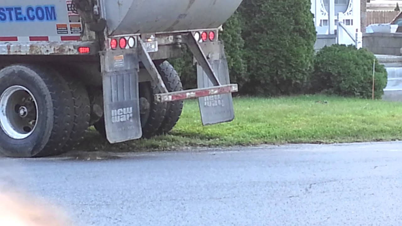 Garbage truck leaching and leaking - YouTube
