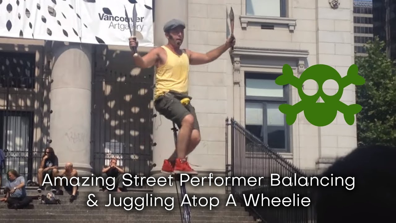 Amazing Street Performer Balancing & Juggling Atop A Wheelie - YouTube