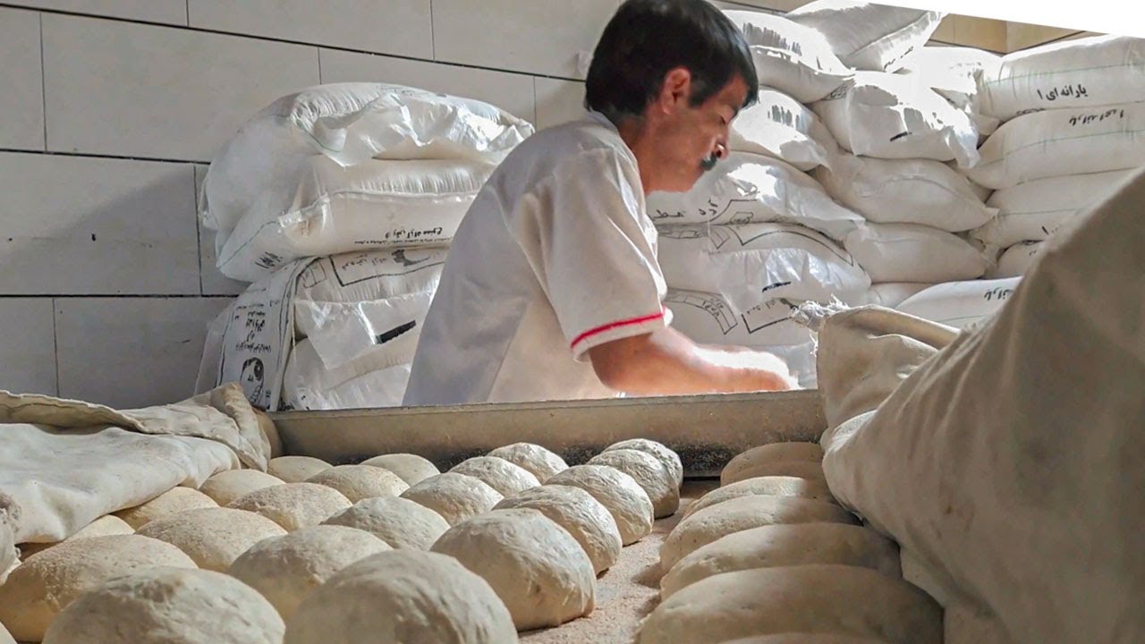 Crazy baker bakes tasty traditional bread/Baking bread/Street food ...