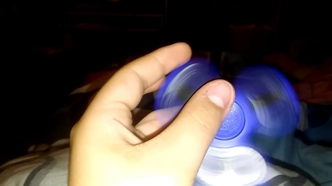 Spinning a fidgit spinner - YouTube
