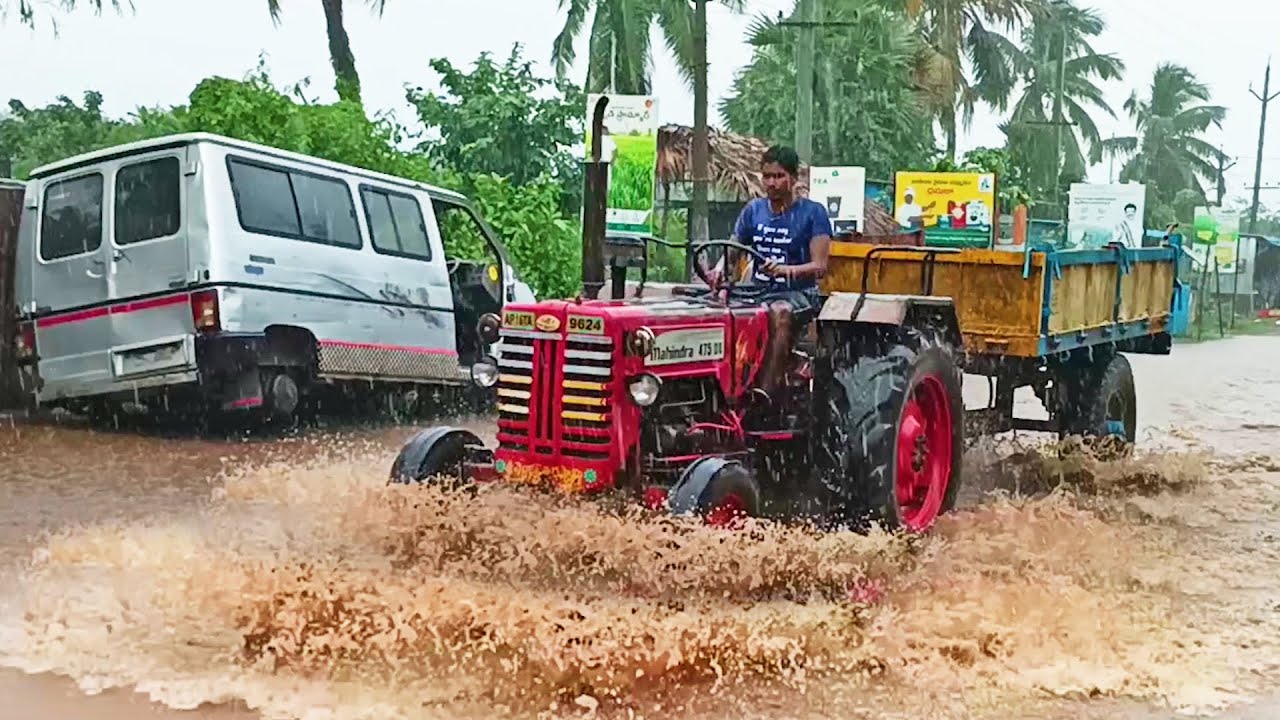 Tractor video : Driving tractor in heavy rain - YouTube