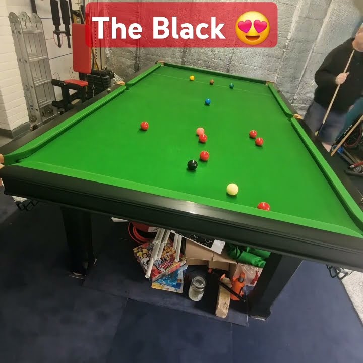 Playing snooker and manage to pott another hard black mid break in the ...