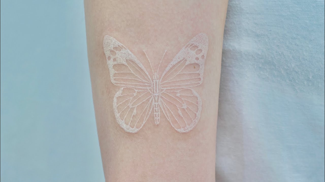 White Ink Butterfly Tattoo