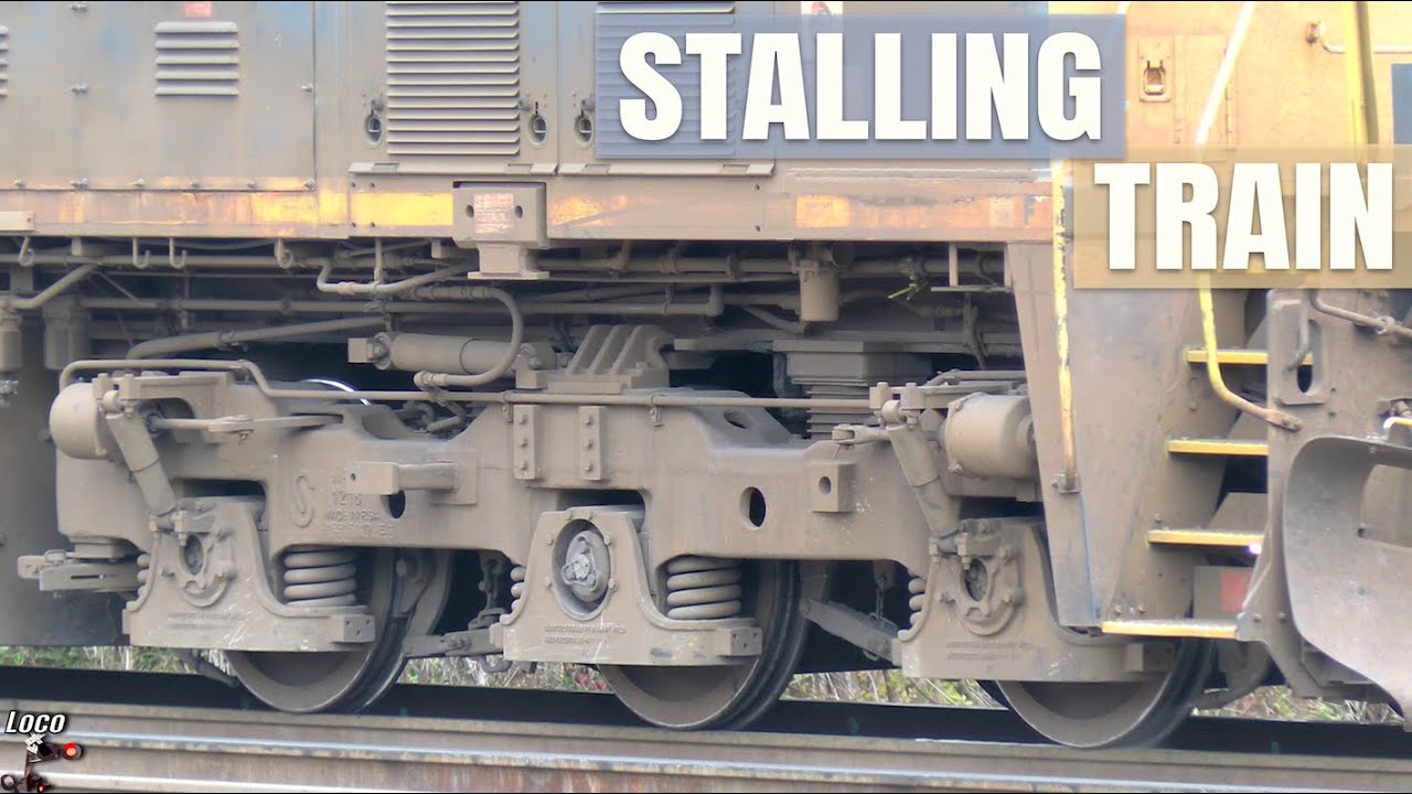 Stalling Freight Train Blows Sand and Wheel Slips Trying to Move - YouTube