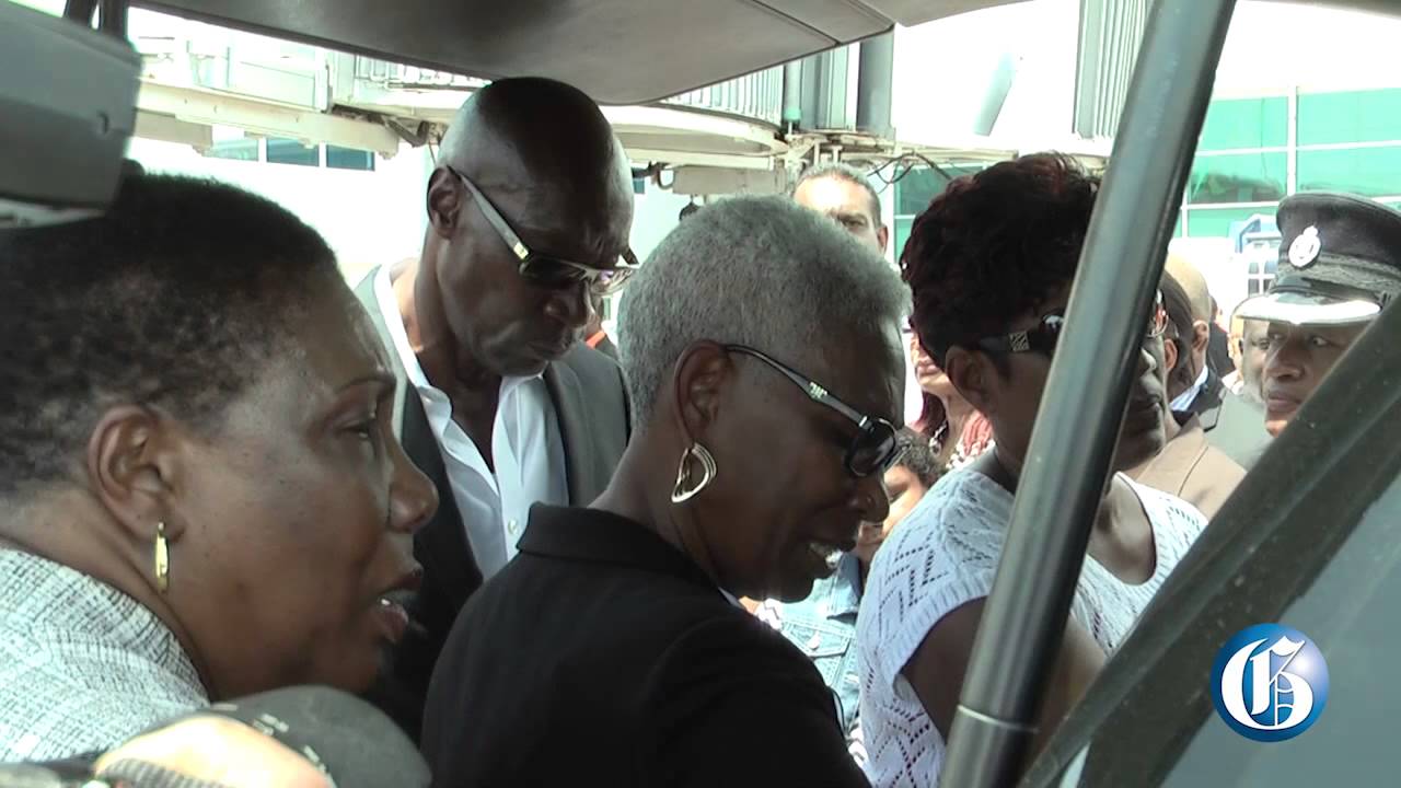 Roger Clarke's body arrives home - YouTube