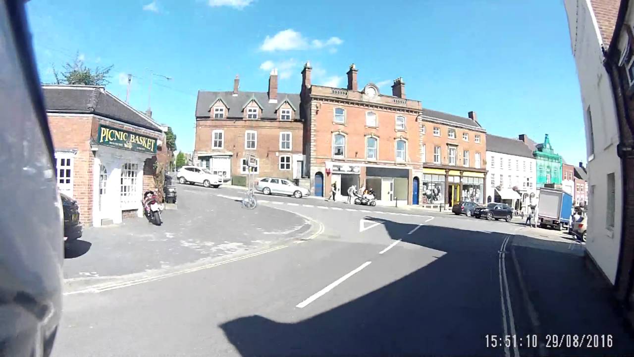 Poor chap faints and falls of his motorbike - YouTube