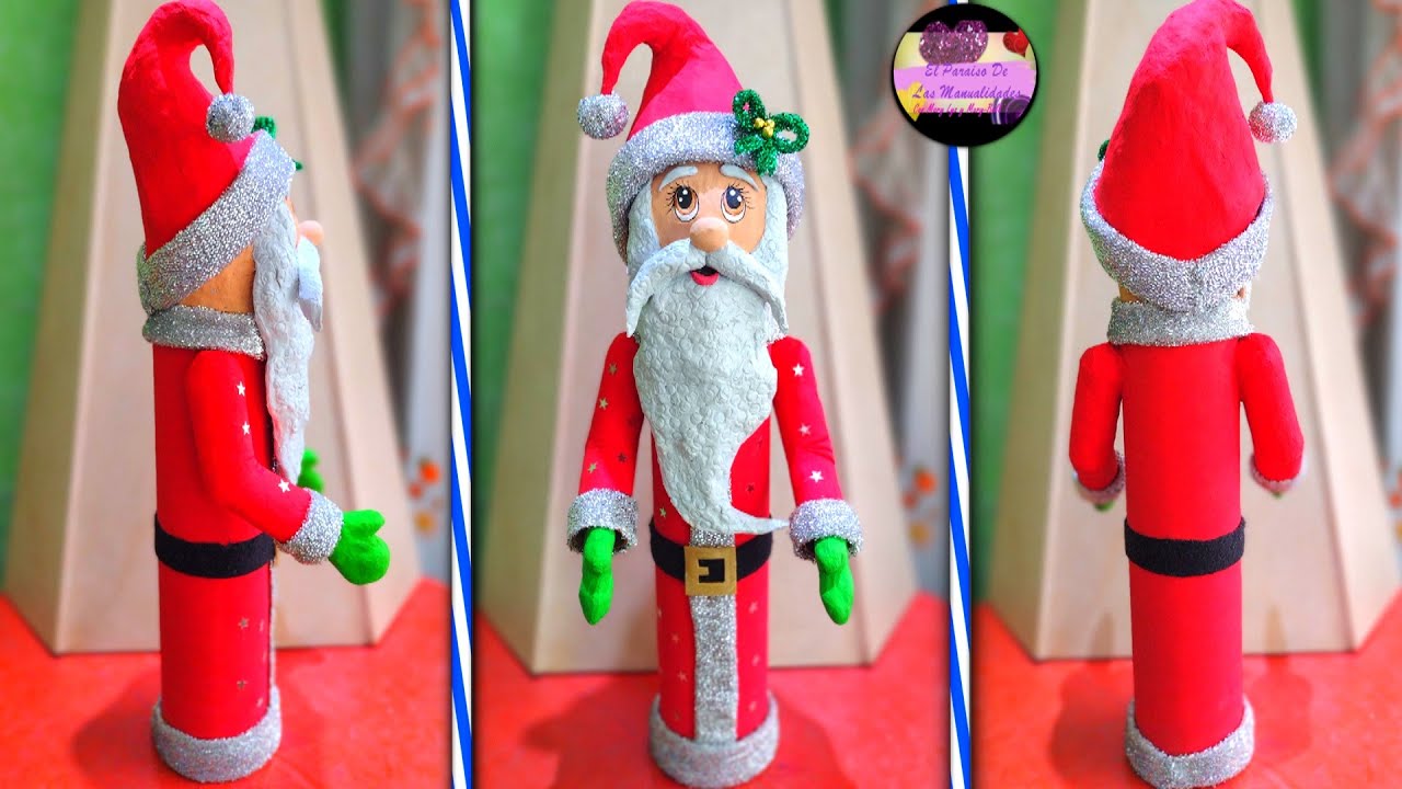 Papa Noel parado grande con tubo de cartón y material reciclable paso a ...