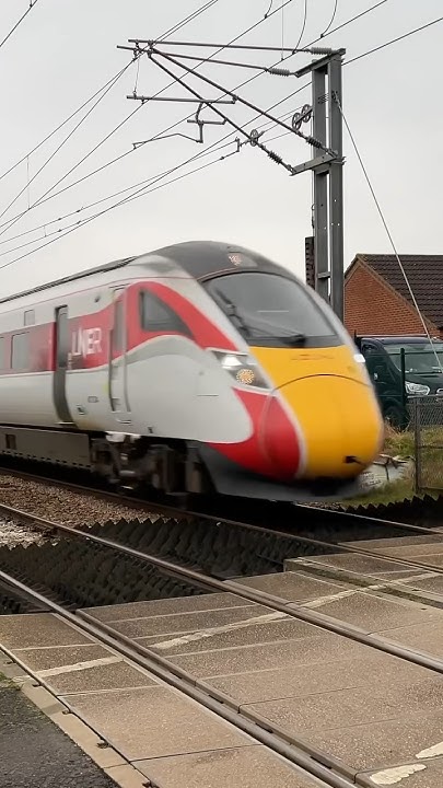 LNER passing Osterfen Lane LC - YouTube