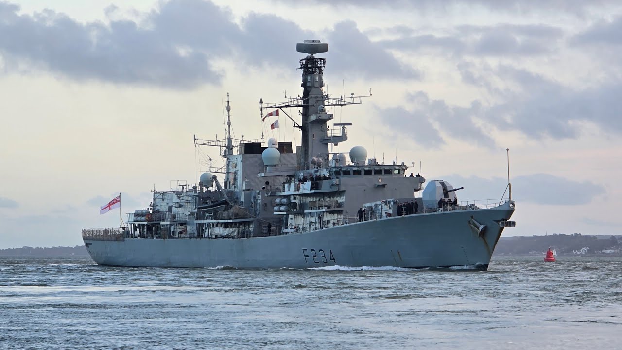 HMS Iron Duke (F234) sailing into Portsmouth late on a Friday evening ...