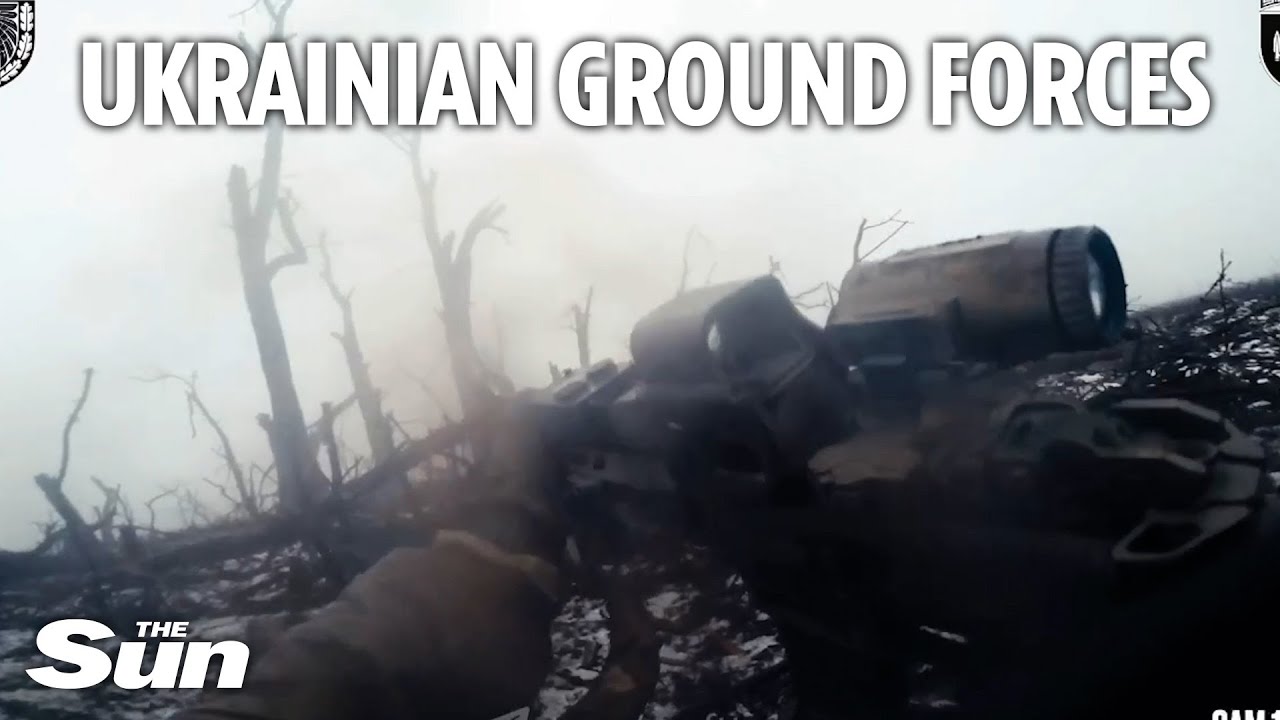 Ukrainian forces fires at Russian positions from a treeline - YouTube