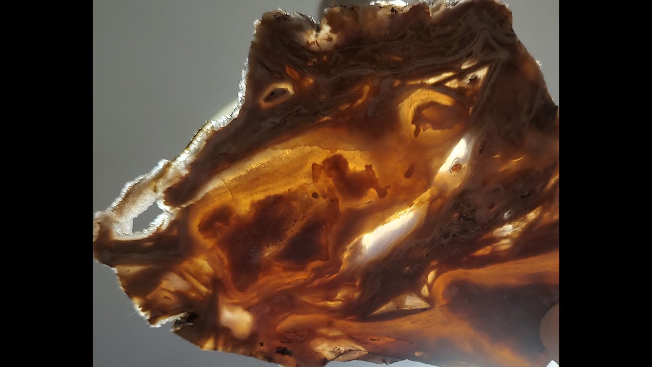 Cutting rocks using a Lortone 12 inch slab saw. Lysite agate, banded ...