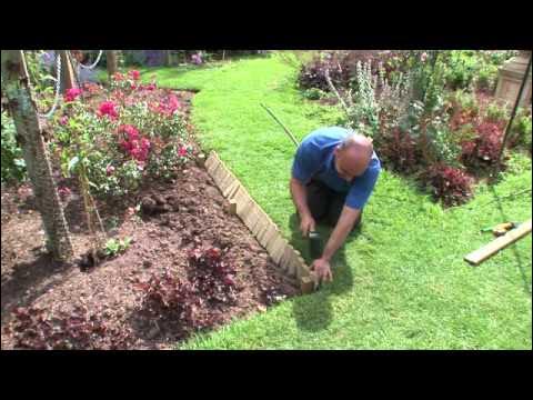 How to install log roll edging | Forest Garden & Howarth Timber - YouTube