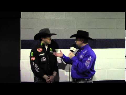 PBR bull rider L.J. Jenkins talks with Jason before the Iron Cowboy VI ...