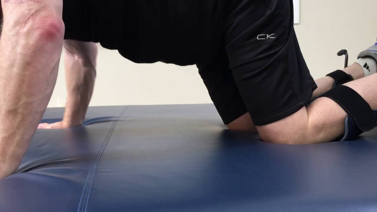 Paraplegic crawling at physical therapy part 1. - YouTube