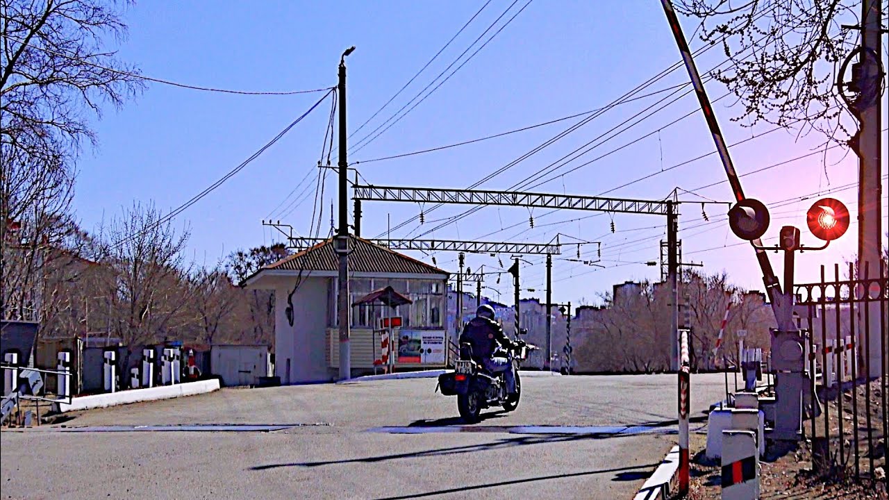 RailWay Russian Railroad Crossing. Biker ignored crossing signals ...