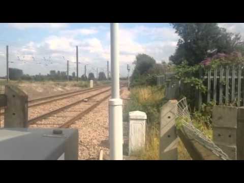 Maxey level crossing - YouTube