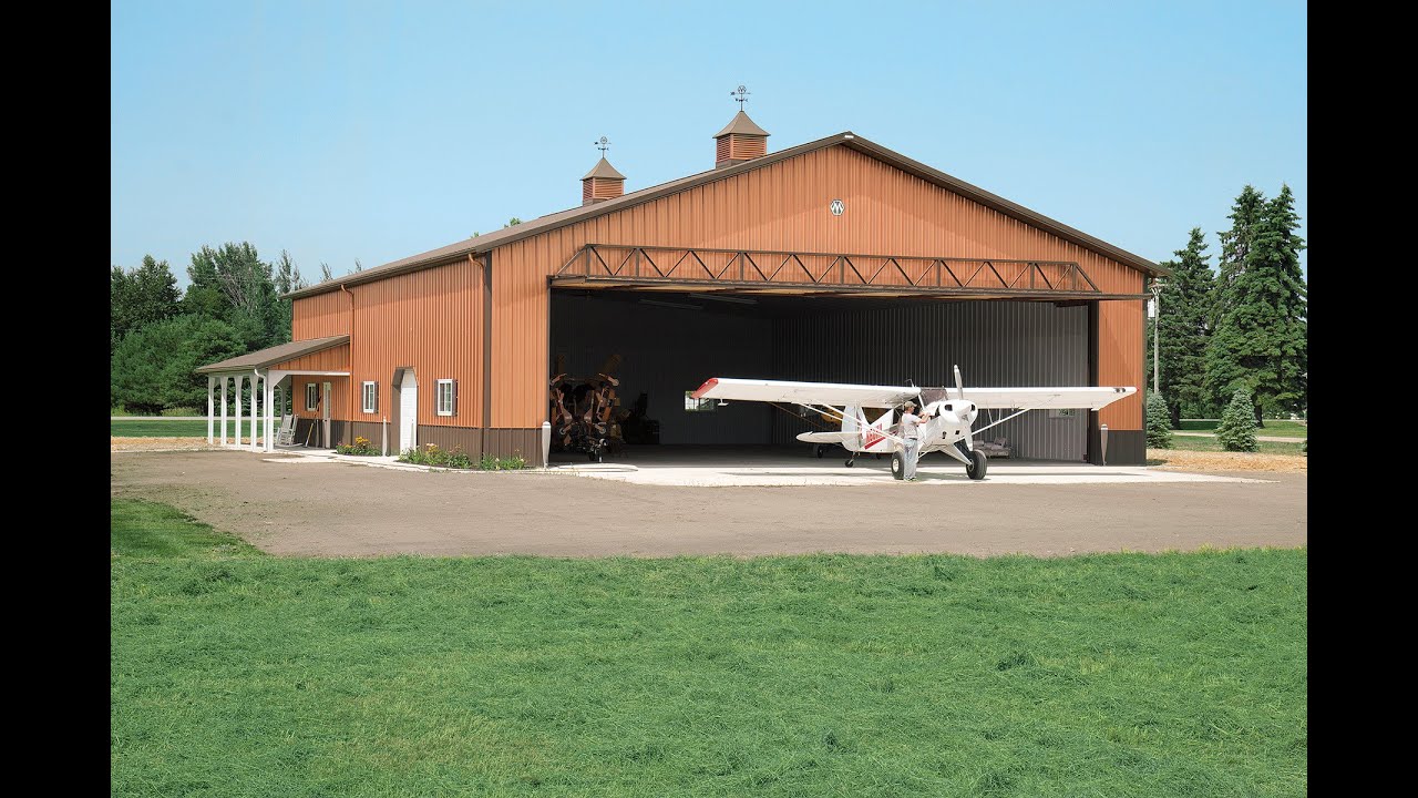 20x9.9 airplane hangar garage doors replaced | 630-271-9343 pt.1 - YouTube