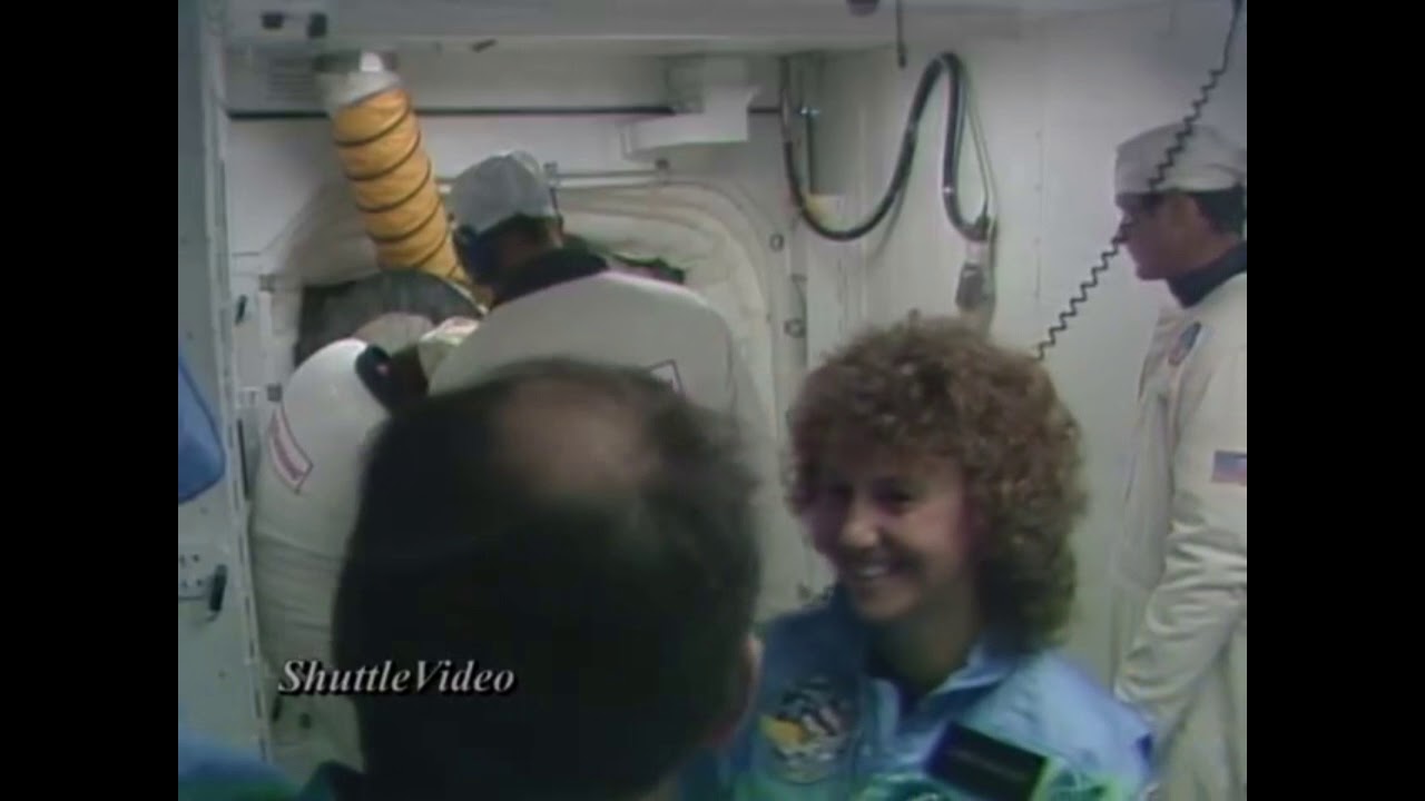Judith Resnik, Ronald McNair, Christa McAuliffe boarding Space Shuttle Challenger disaster 1986 ...