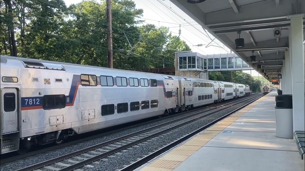 NB Amtrak Acela, SB MARC train cab car 7848 MP36 15 and NB Express MARC Train MP36 33 cab car ...