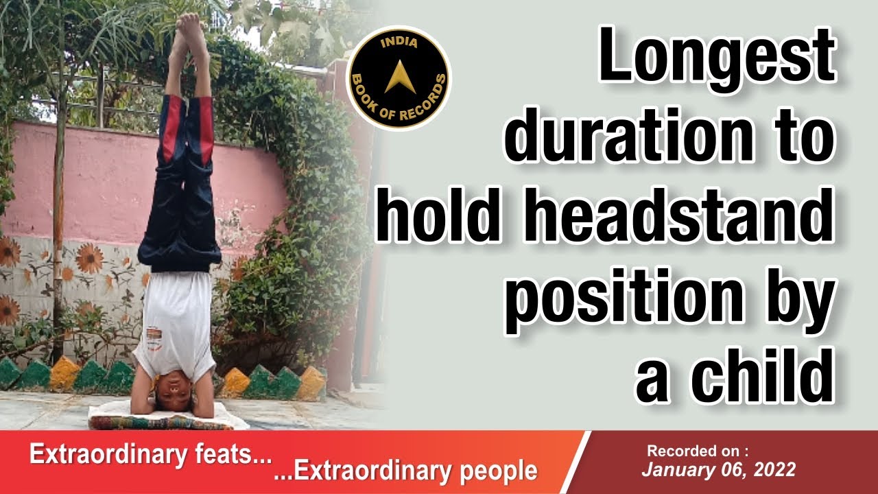 Longest duration to hold headstand position by a child - YouTube