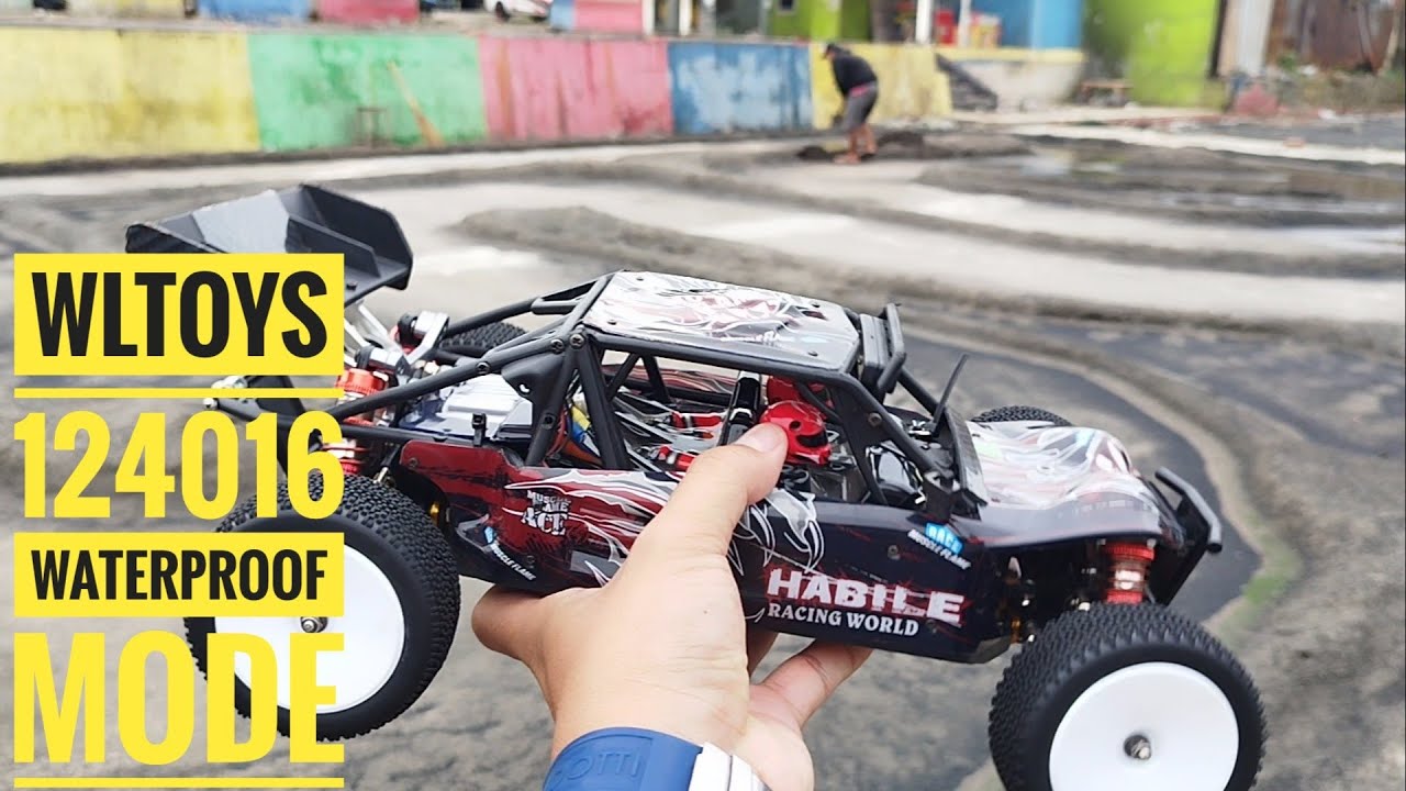 WLtoys 124016 waterproof on Tangerang RC track. . . - YouTube